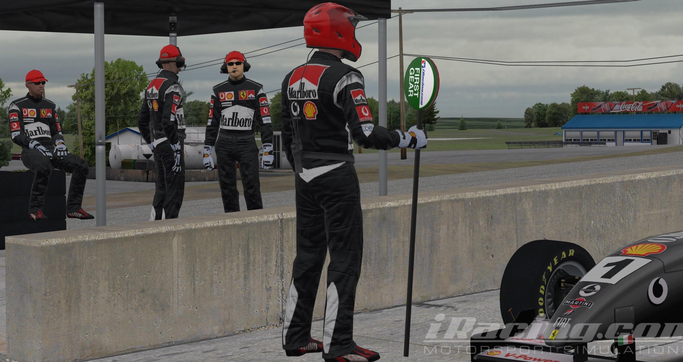 Black suit Ferrari by Robert JL Henry - Trading Paints